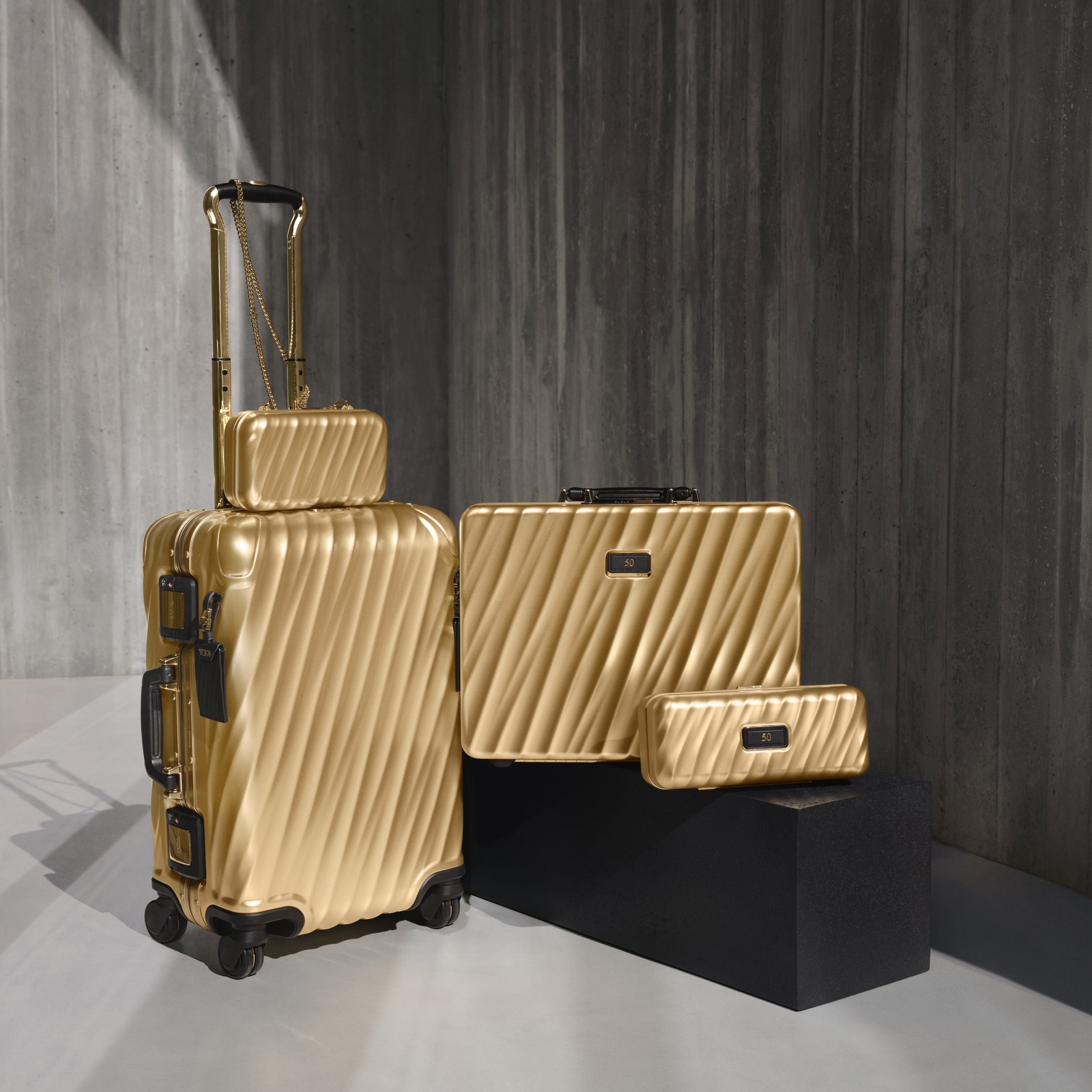 TUMI Turns 50 with a Gilded Milestone Collection
